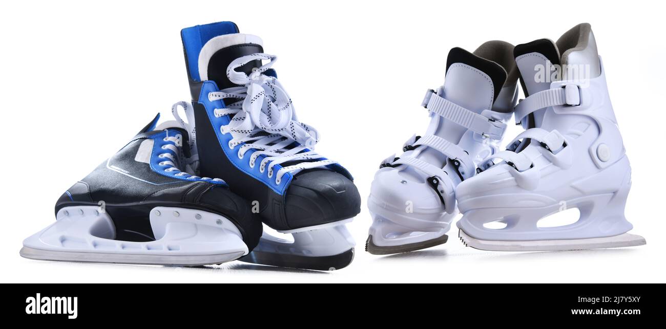 Two pairs of ice skates isolated on white background Stock Photo - Alamy