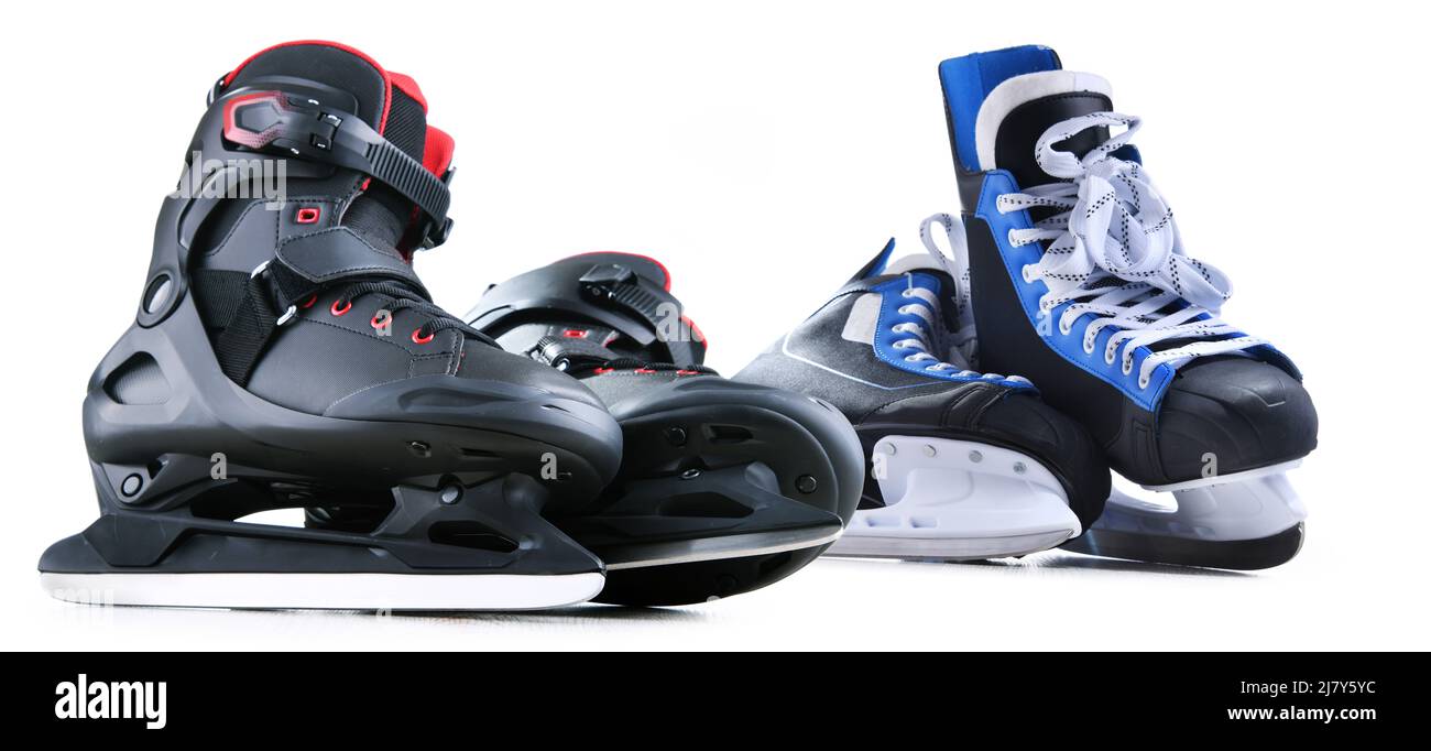 Two pairs of ice skates isolated on white background Stock Photo - Alamy