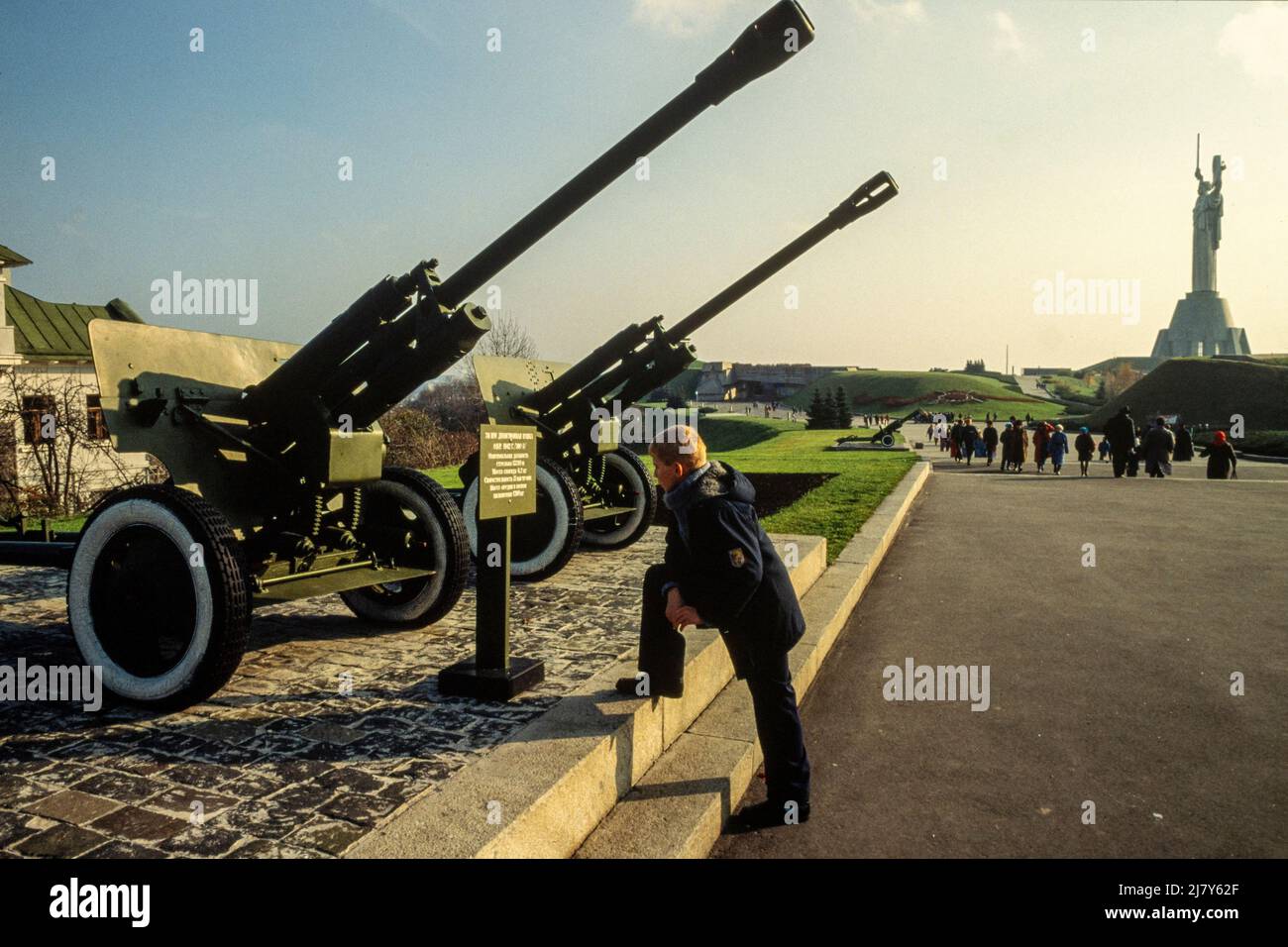 A boy looking a the guns on display at the the Motherland Memorial to ...