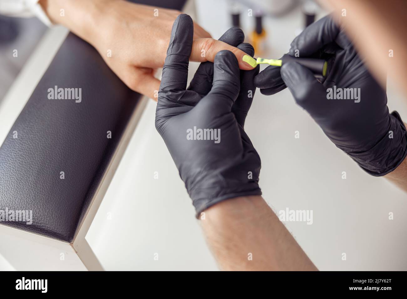 Proffesional manicure master working on nails in salon Stock Photo - Alamy