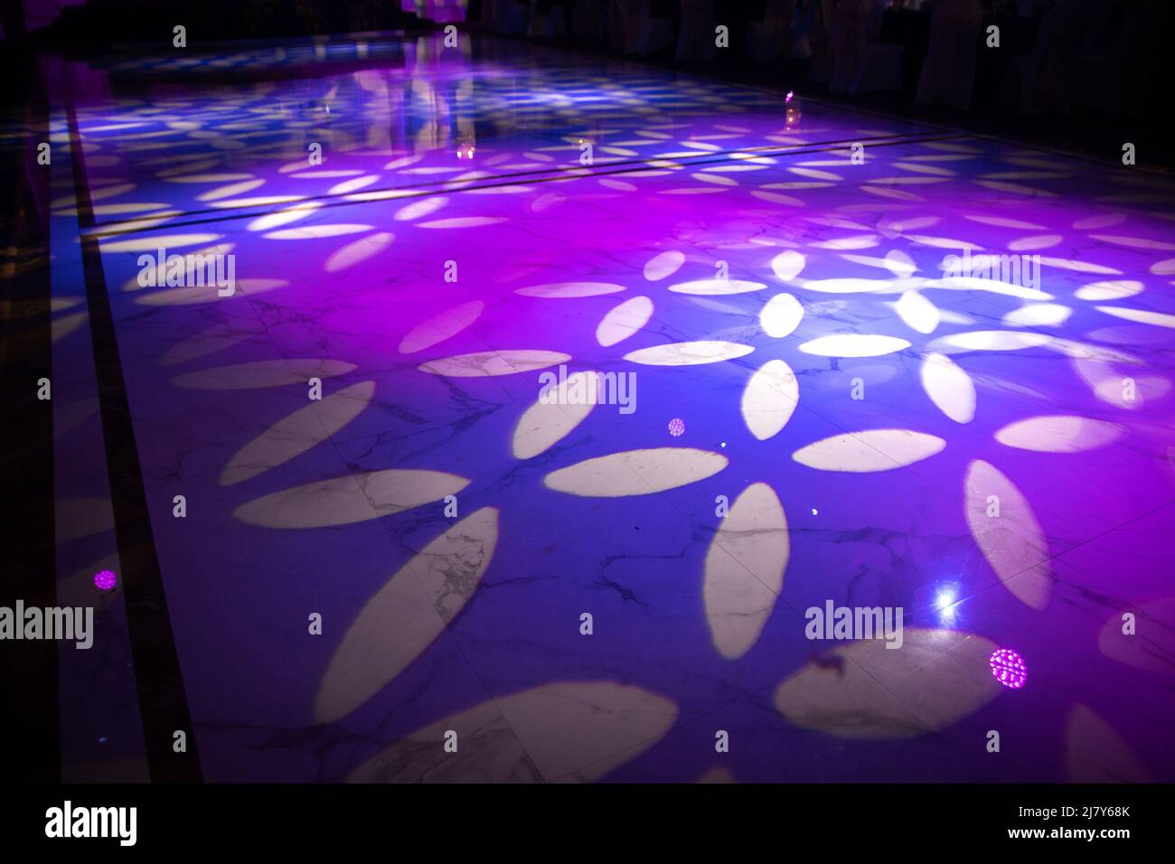 Light pattern on a dark dance floor created by professional lighting ...