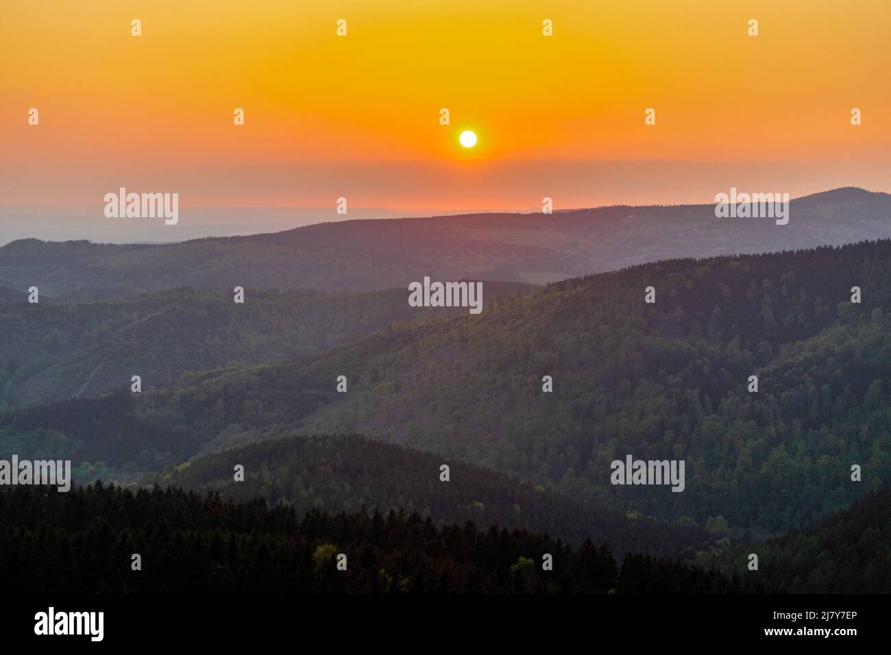 Fantastic sunset on the heights of the Thuringian Forest around the ...