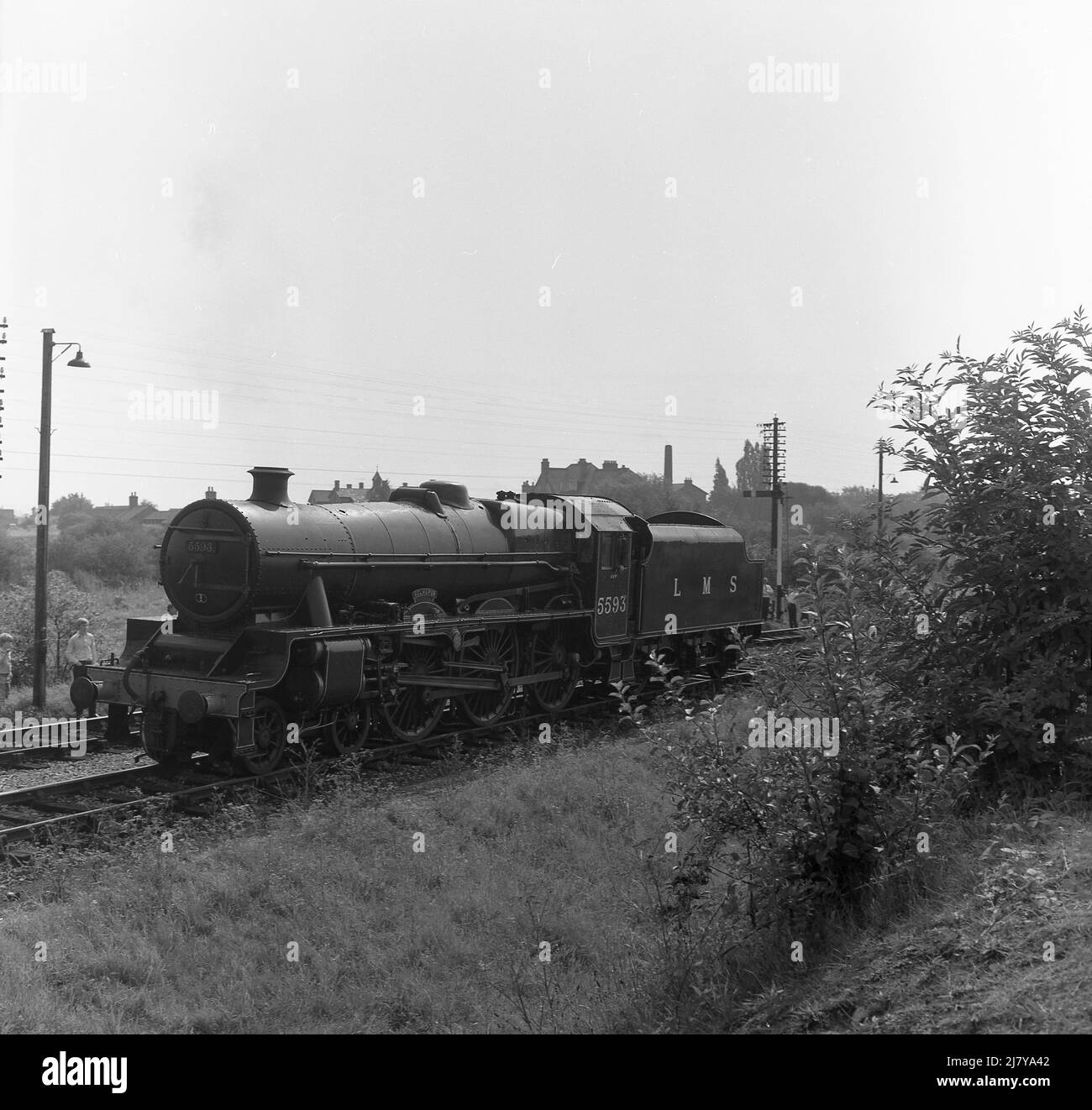 1969, historical, man on track talking to the drivers of the waiting ...