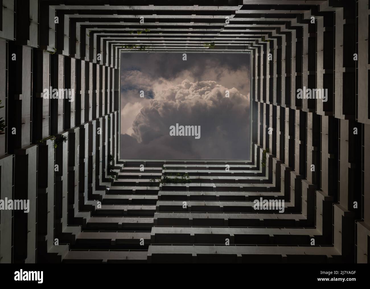 Bottoms up view of the cascading rectangular corridors balcony opening ...