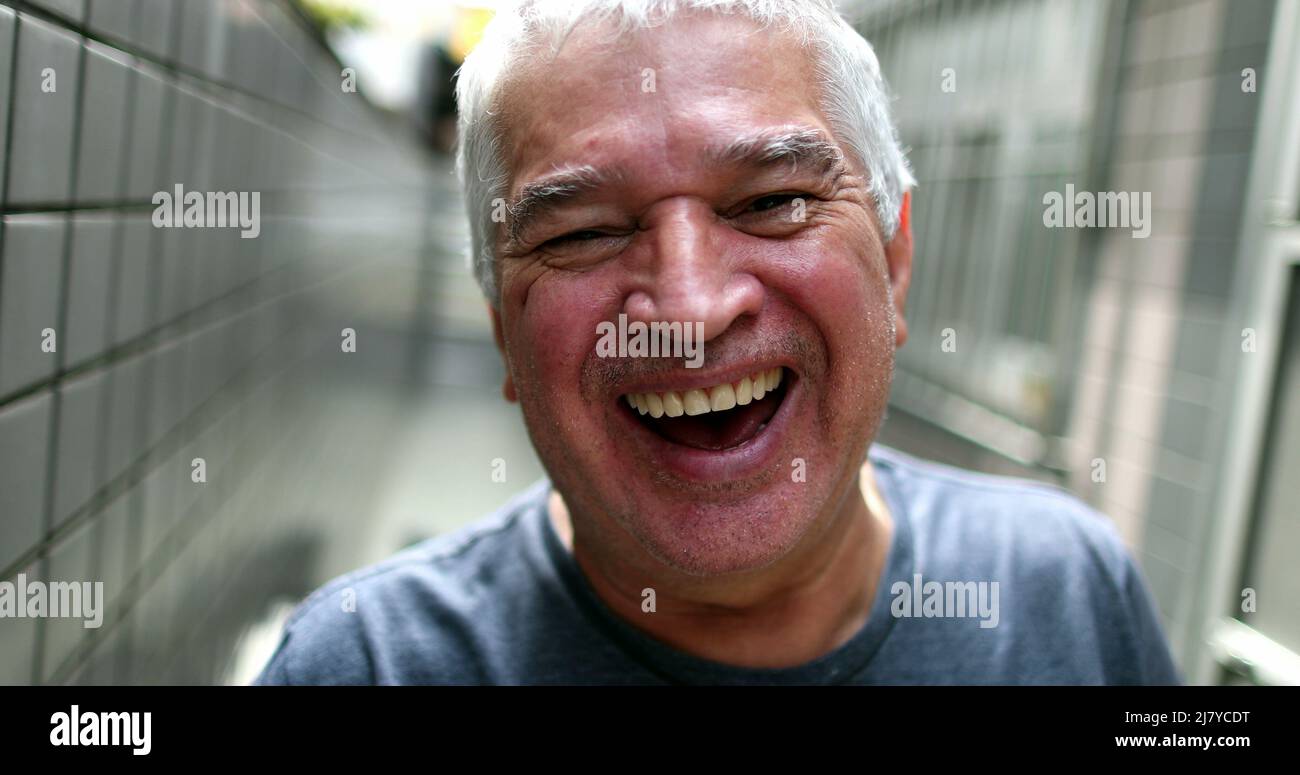 Casual older man laughing camera hi-res stock photography and images ...
