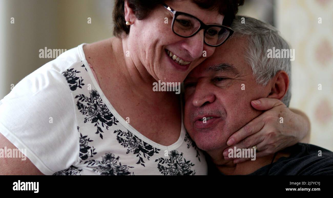 Happy older couple hugging each other. Married senior husband and wife ...