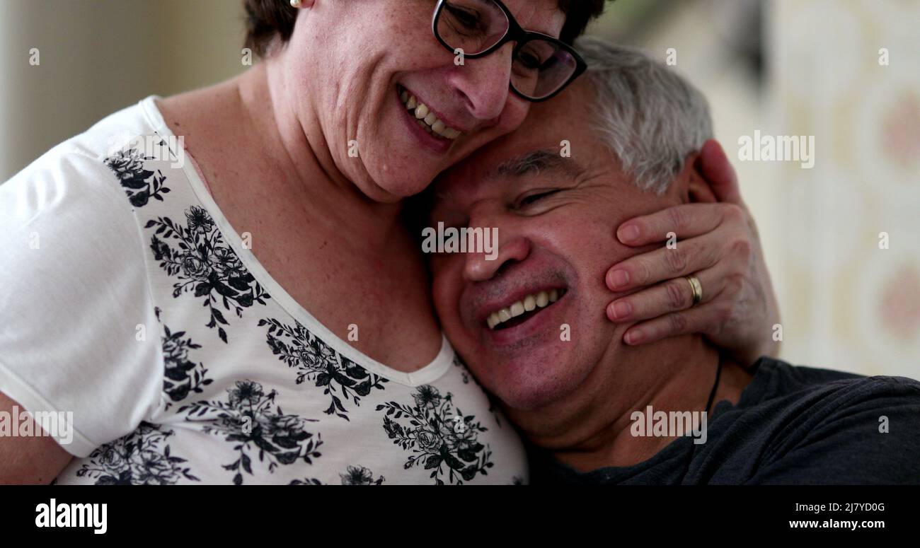 Happy older couple hugging each other. Married senior husband and wife ...