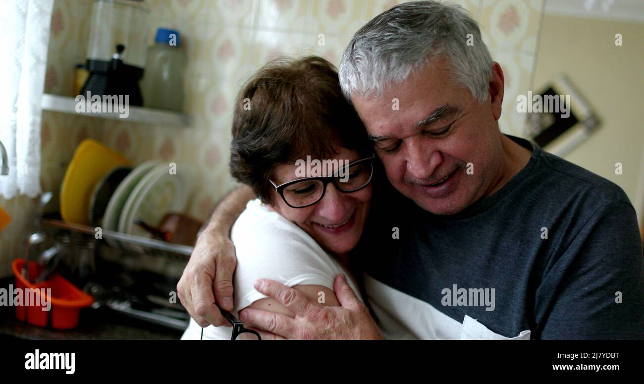 Loving caring married older couple relationship. Husband kissing wife ...