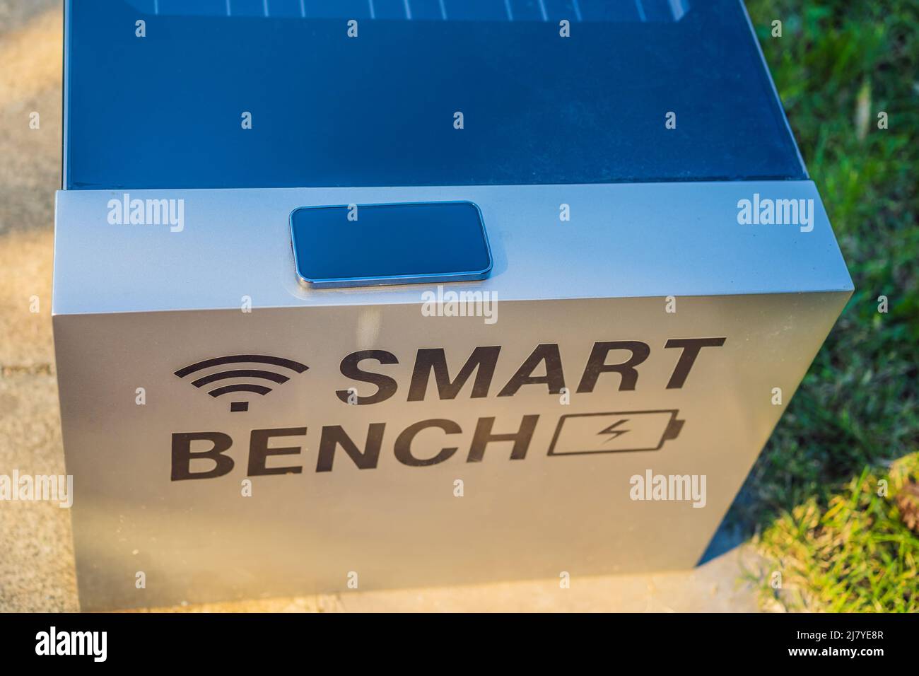 New smart bench in local public park used for charging mobile phones ...