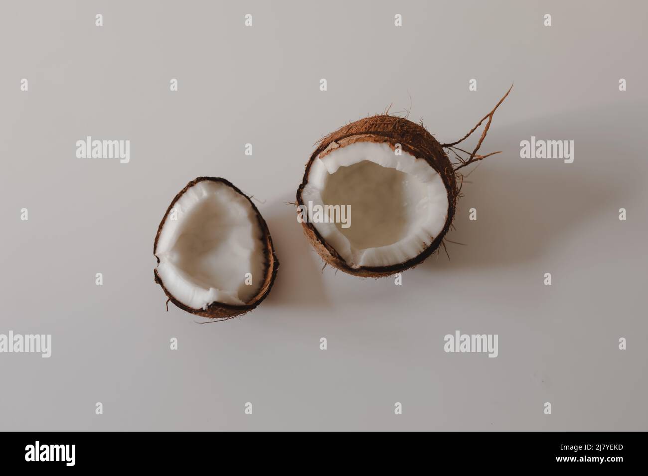 opened coconut slice and pieces isolated on white background Stock ...