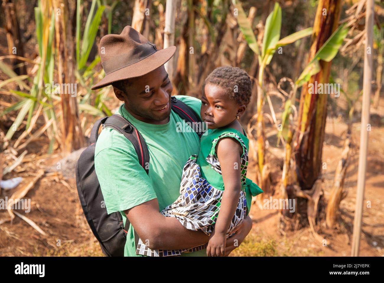 African father happy hugs his toddler daughter, love between father and ... African father happy hugs his toddler daughter, love between father and ...