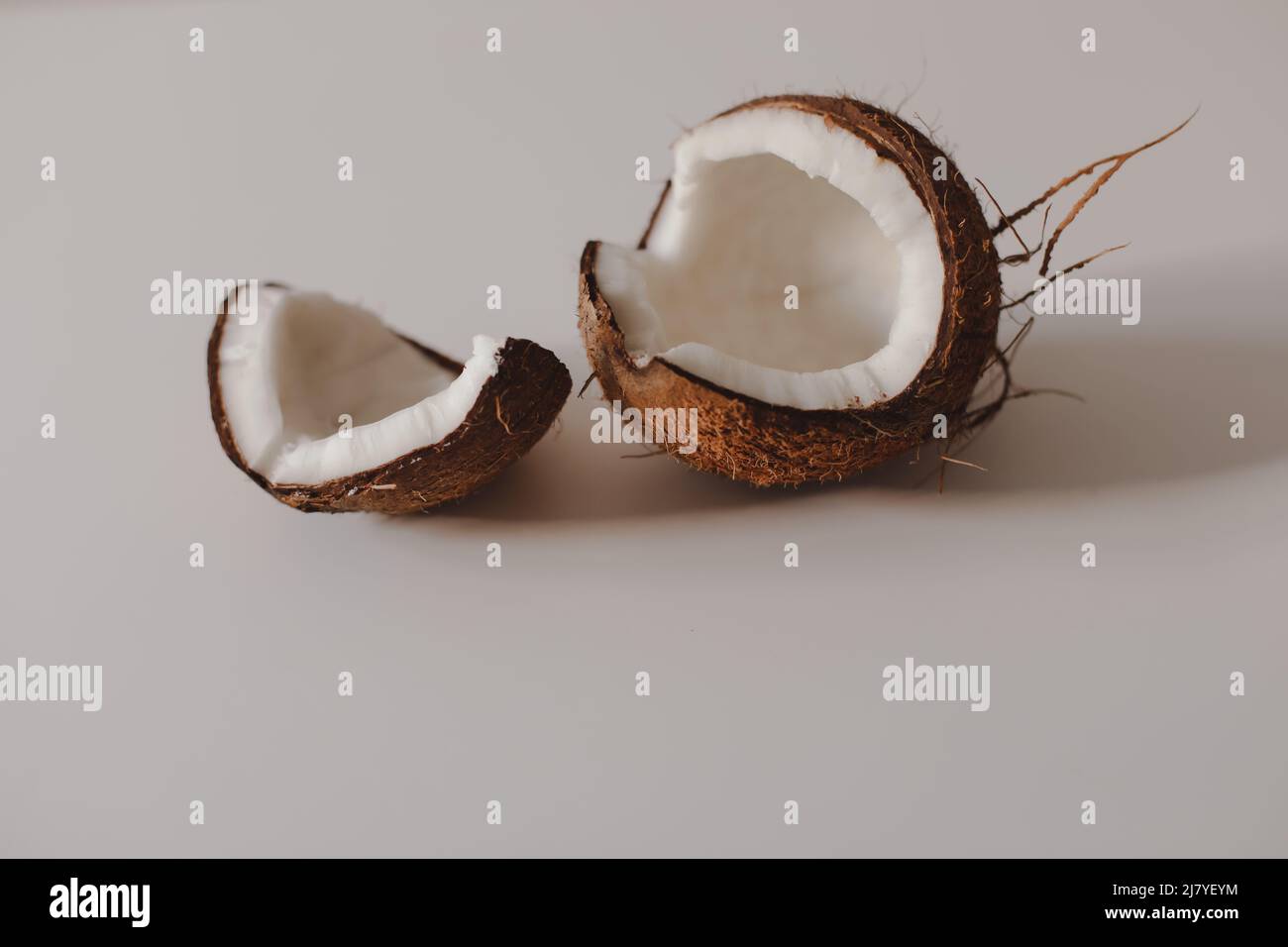 opened coconut slice and pieces isolated on white background Stock ...