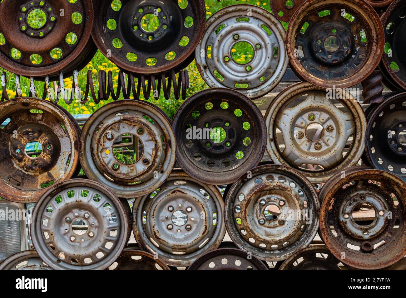 wall, texture from old welded wheel discs of cars. Texture, background ...