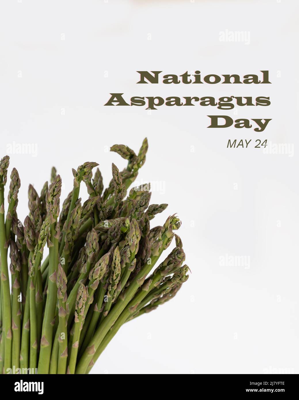 Bunch of fresh green asparagus isolated on white background. Written ...