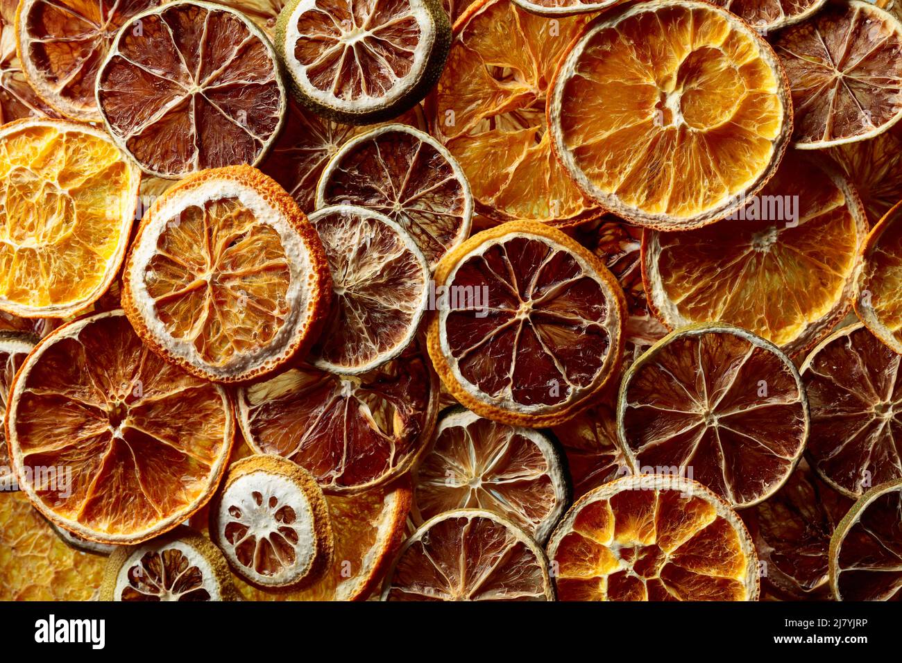 Dried citrus background. Dehydrated crispy fruit slices. Healthy meal ...