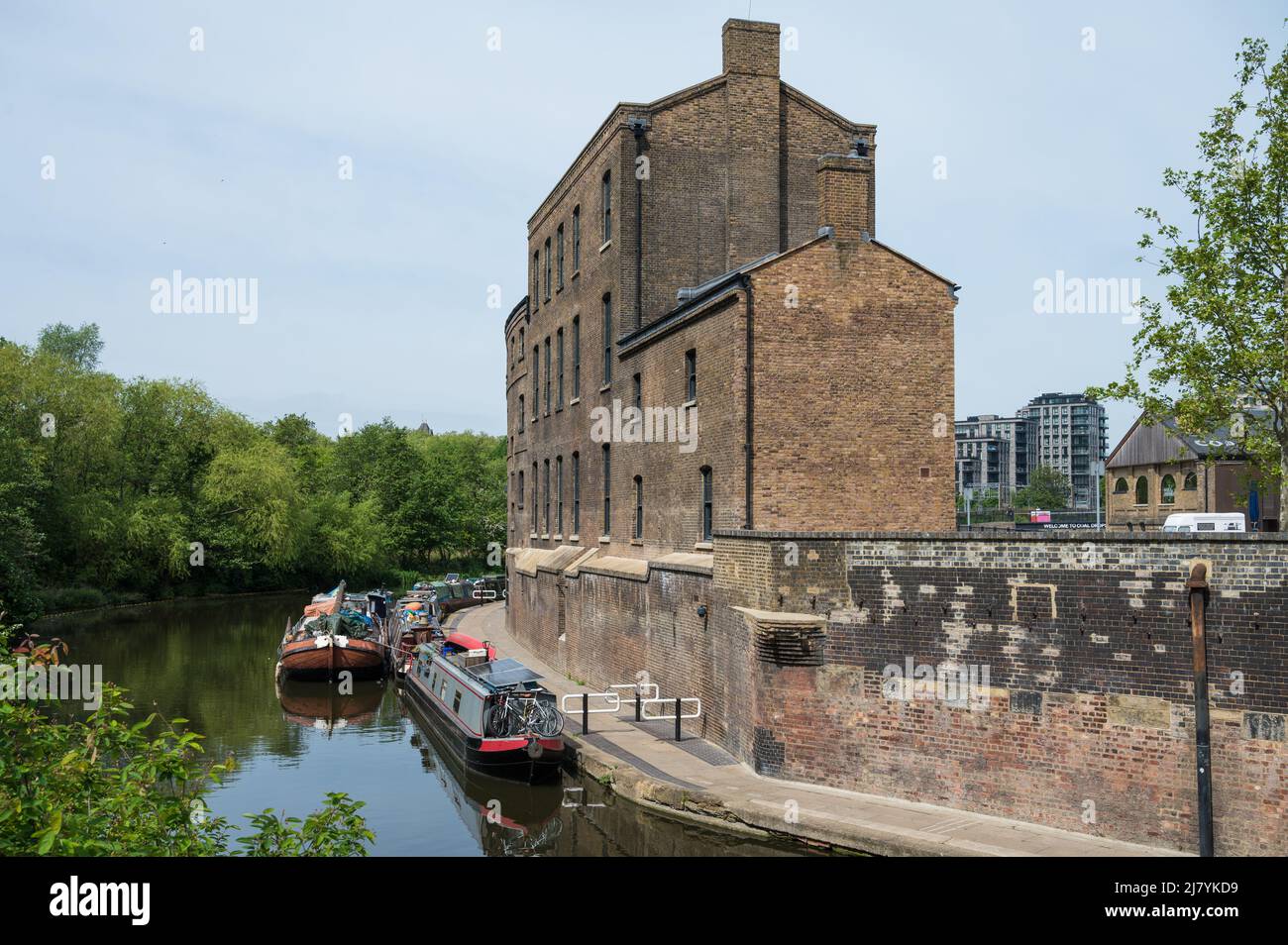 Canal narrow boats moored alongside the tow path on the Regents Canal ...