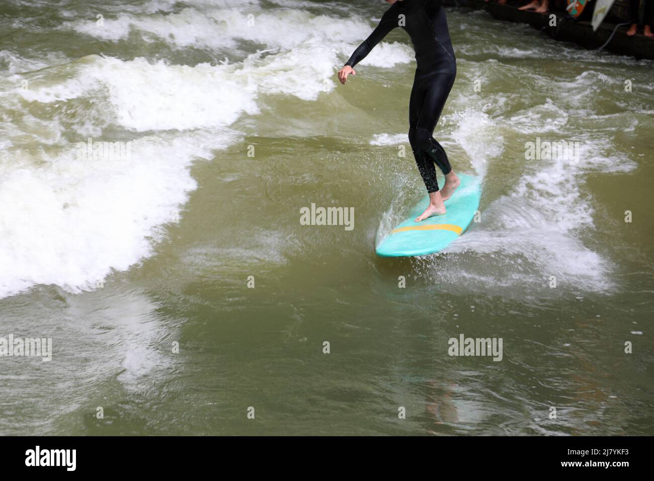 Young surfer is balancing on his surfboard hi-res stock photography and ...