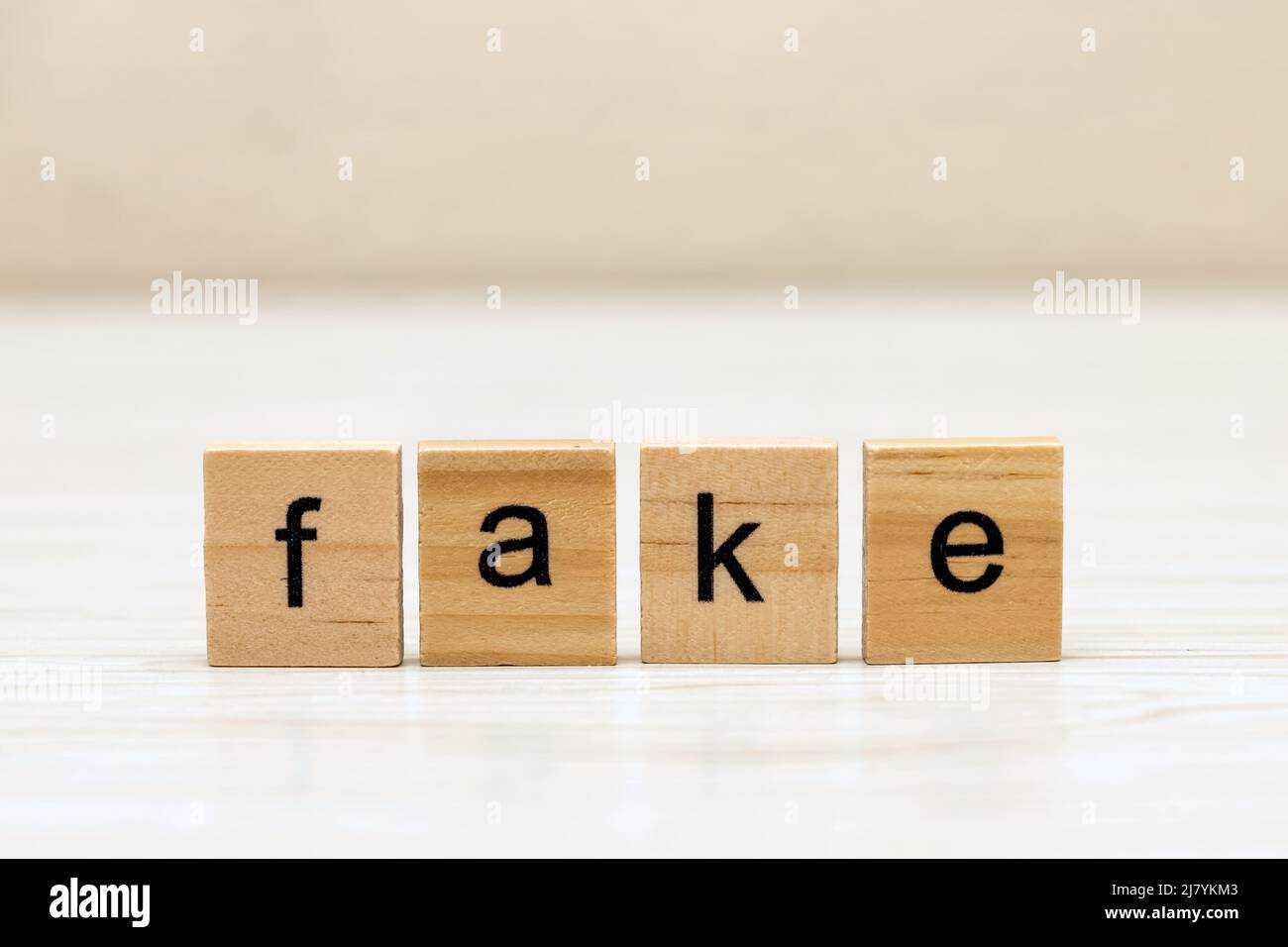 Wooden letters with text Fake news. Journalism, propaganda, social ...