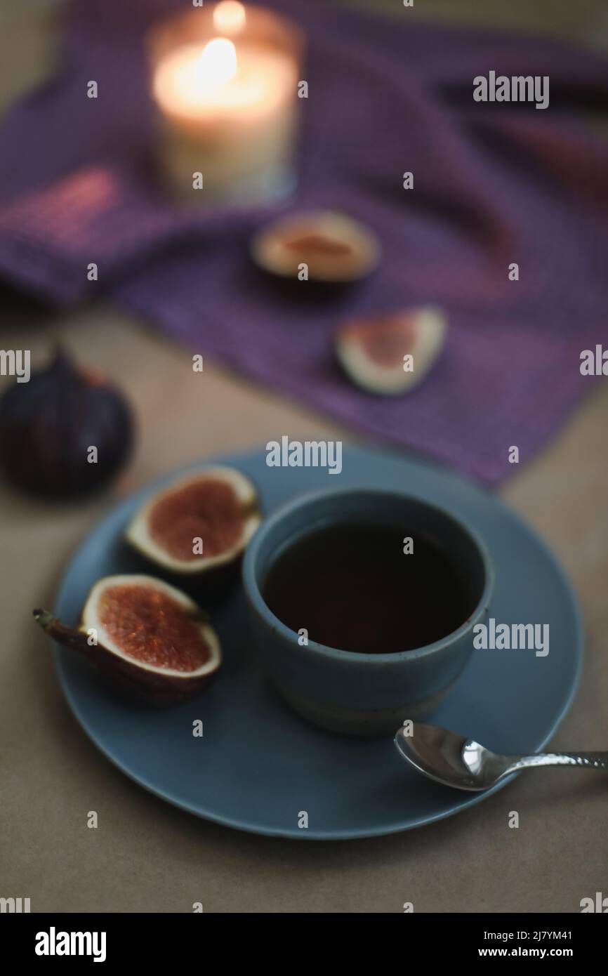 still life with ripe fresh figs and purple textiles Stock Photo - Alamy