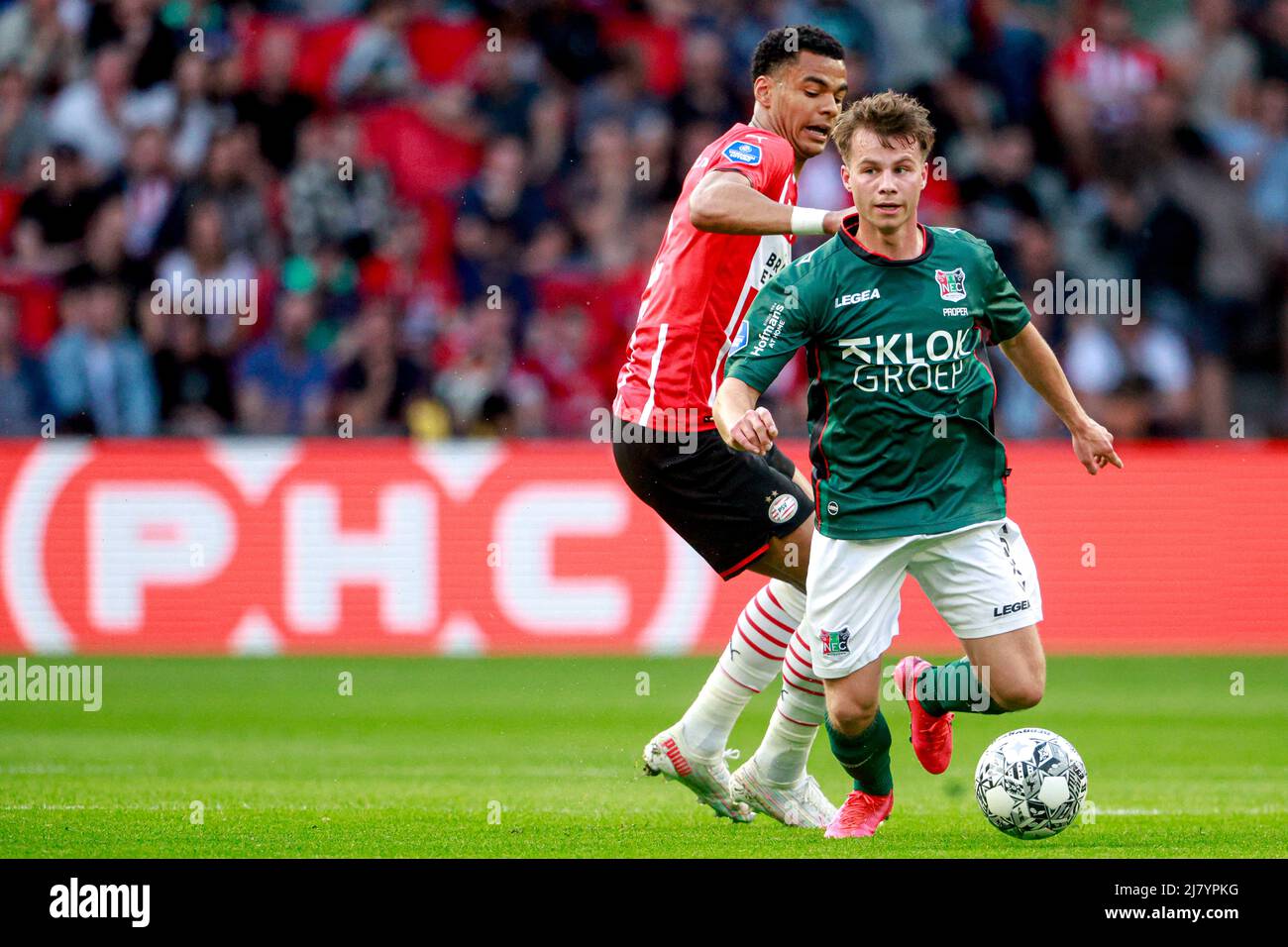 EINDHOVEN, NETHERLANDS - MAY 11: Dirk Proper of N.E.C., Cody Gakpo of ...
