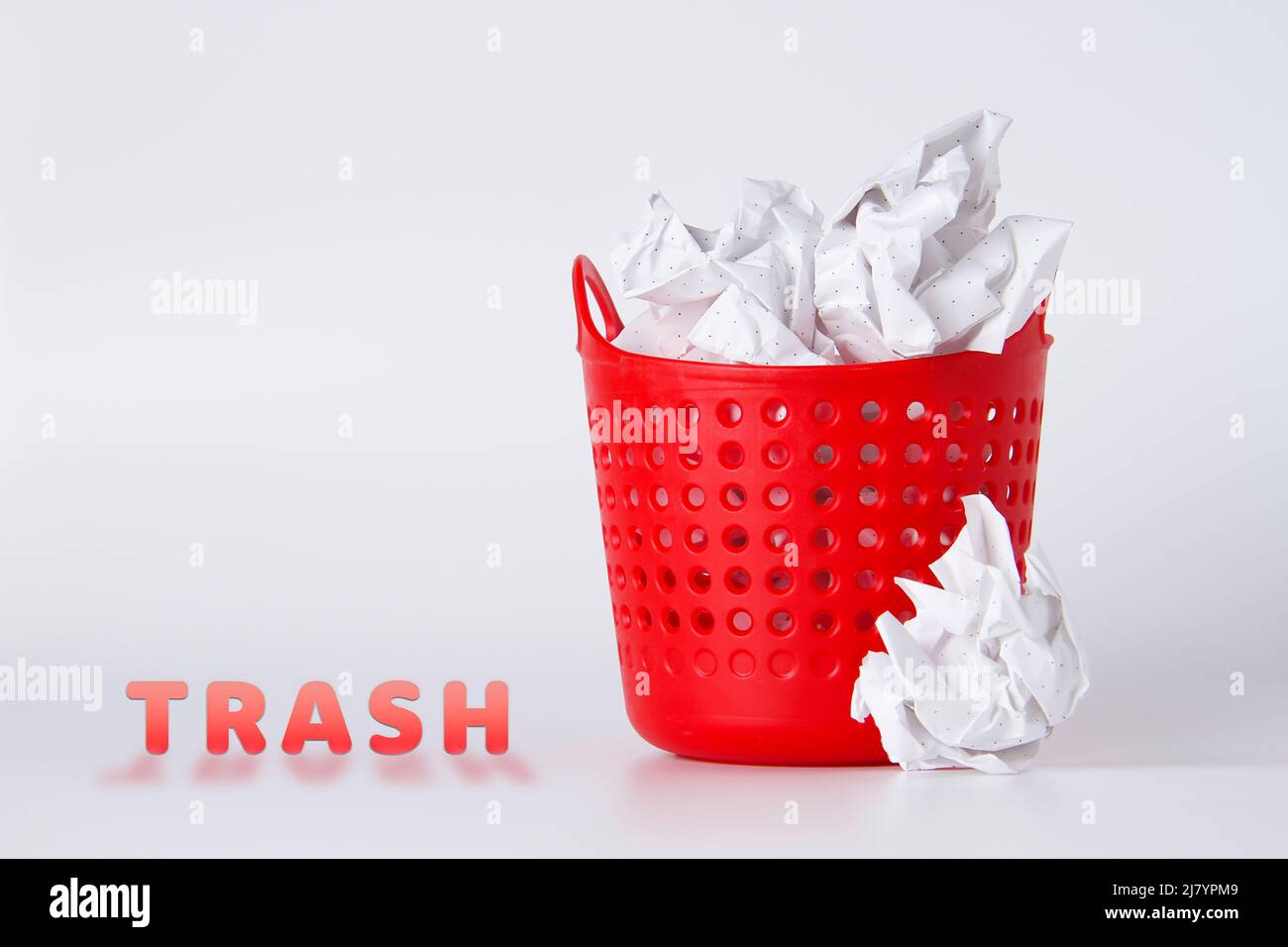 Trash can. Full basket. Crumpled paper in a basket. A mountain of ...