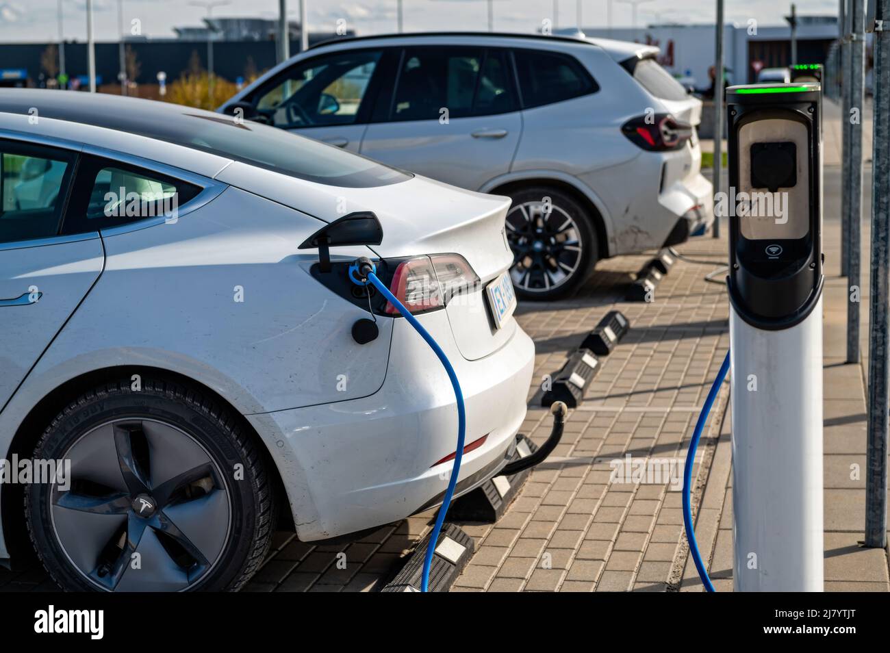 Riga, Latvia, April 29, 2022: electric cars Tesla Model S and BMW ix3 ...