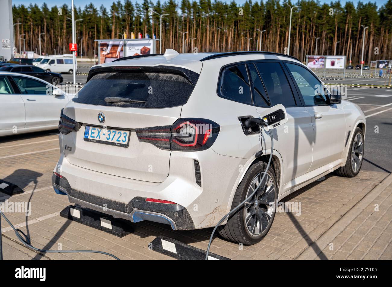 Riga, Latvia, April 29, 2022: electric cars Tesla Model S and BMW ix3 ...