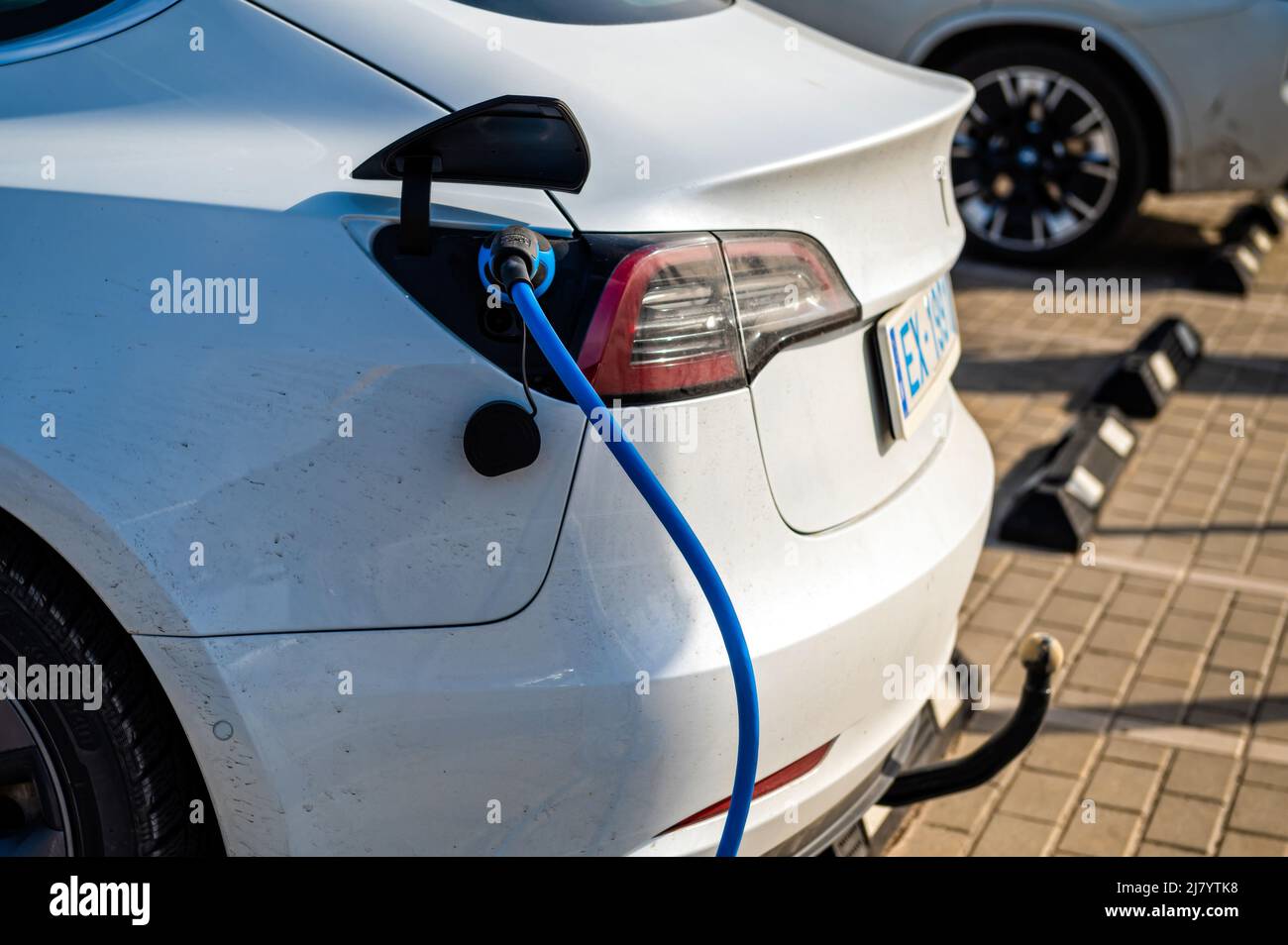 Riga, Latvia, April 29, 2022: electric cars Tesla Model S and BMW ix3 ...