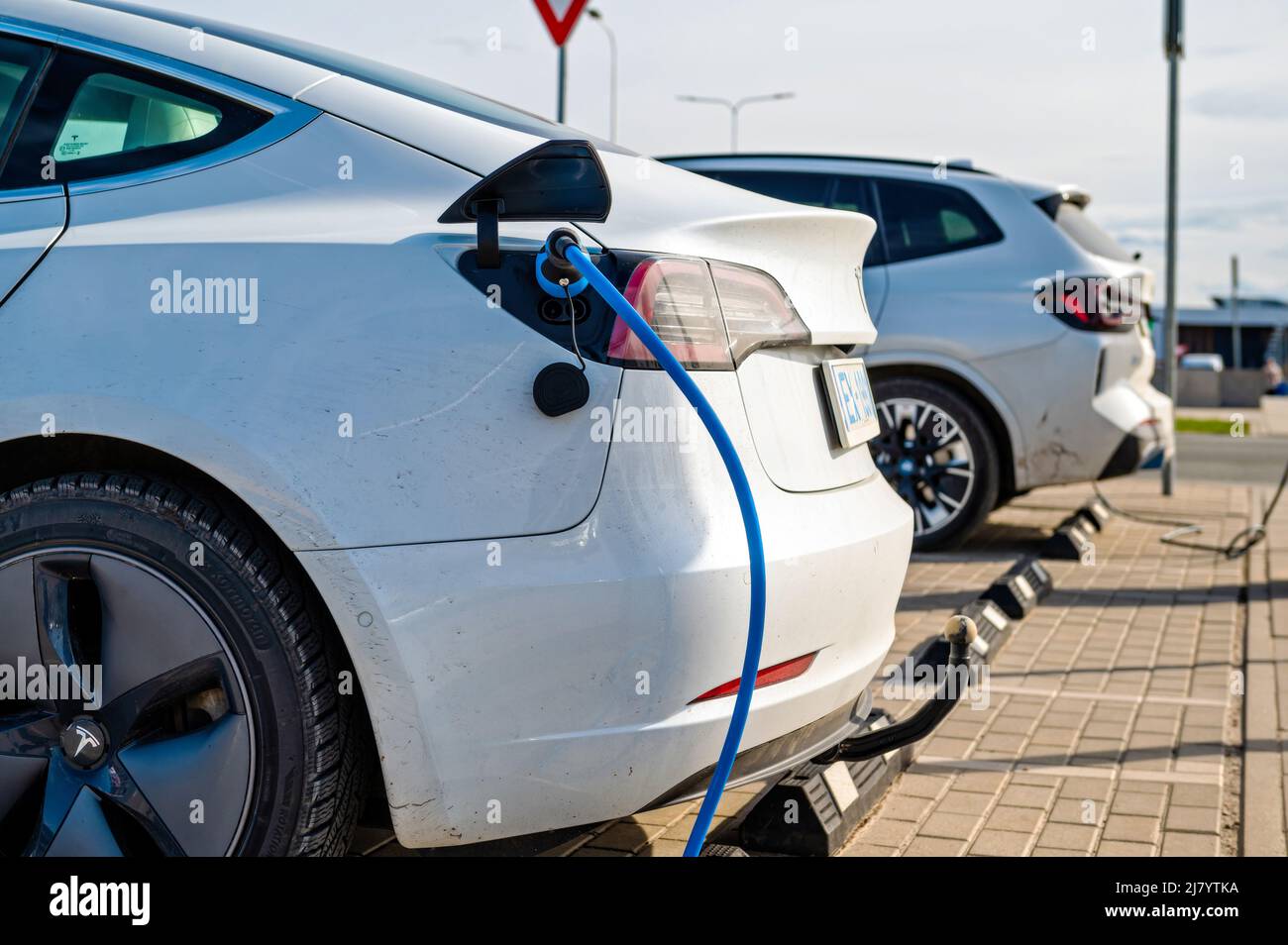 Riga, Latvia, April 29, 2022: electric cars Tesla Model S and BMW ix3 ...