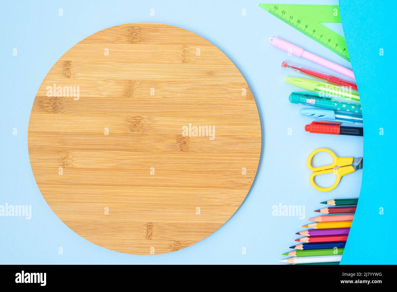Wood round sign with border of stationery on the blue background Stock ...