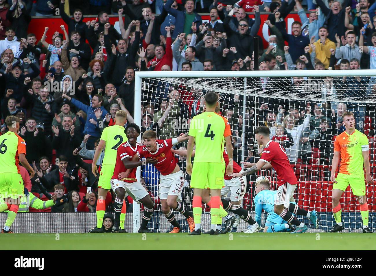 Rhys Bennett #5 of Manchester United celebrates opening the scoring ...