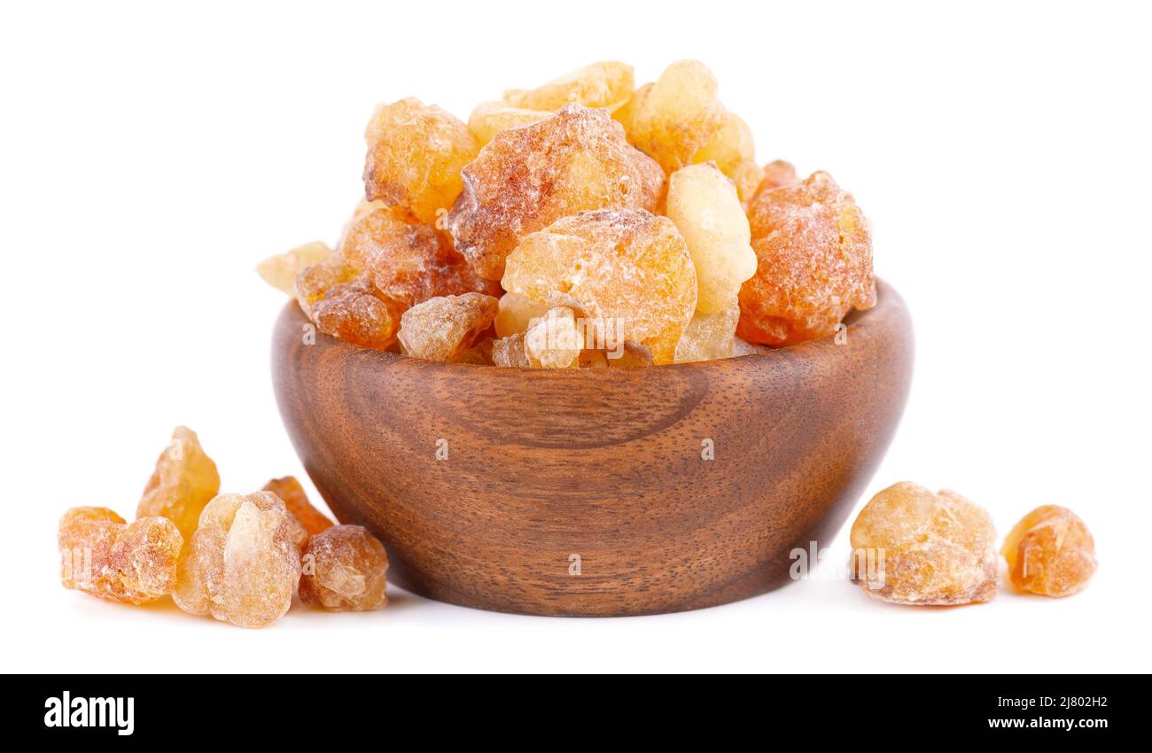 Frankincense resin in wooden bowl, isolated on white background. Pile ...