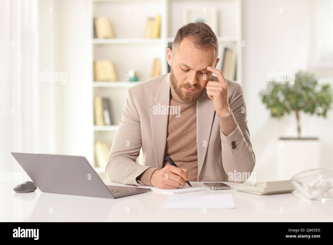 Male office laptop writing hi-res stock photography and images - Alamy