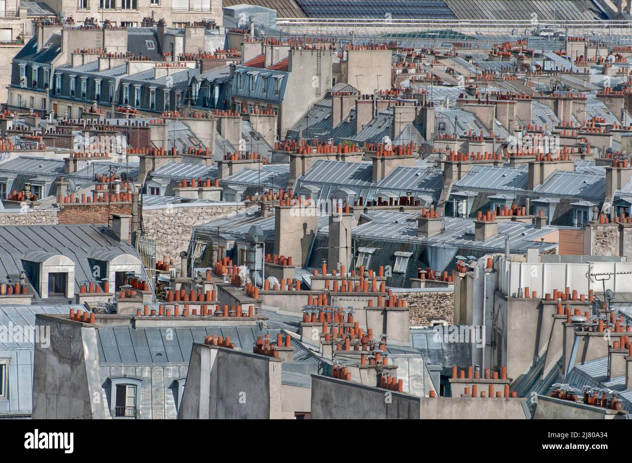 A view over buildings in Paris, seen from Basilica Sacré-Cœur: tin ...