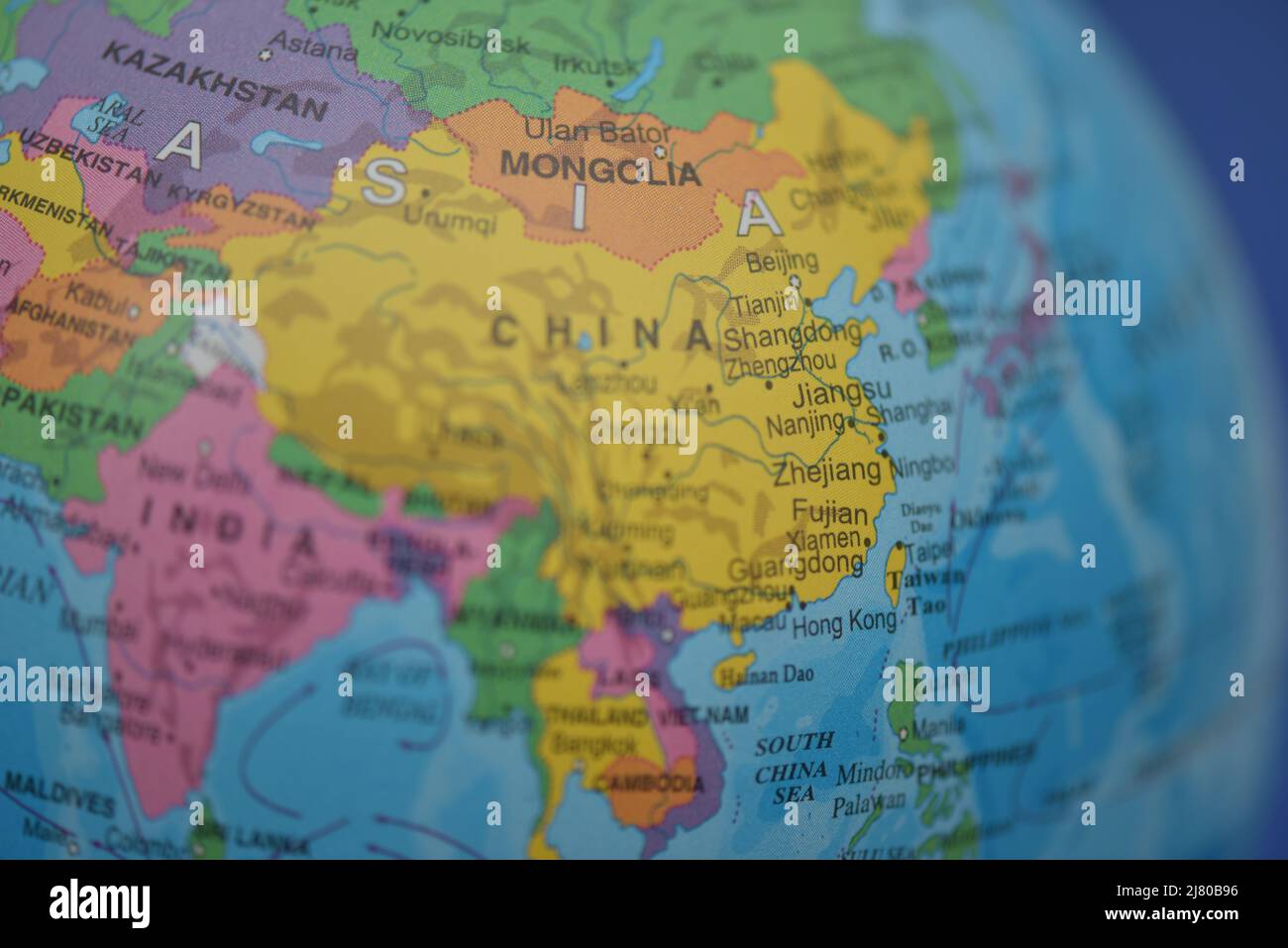 World globe ball on blue background Stock Photo - Alamy