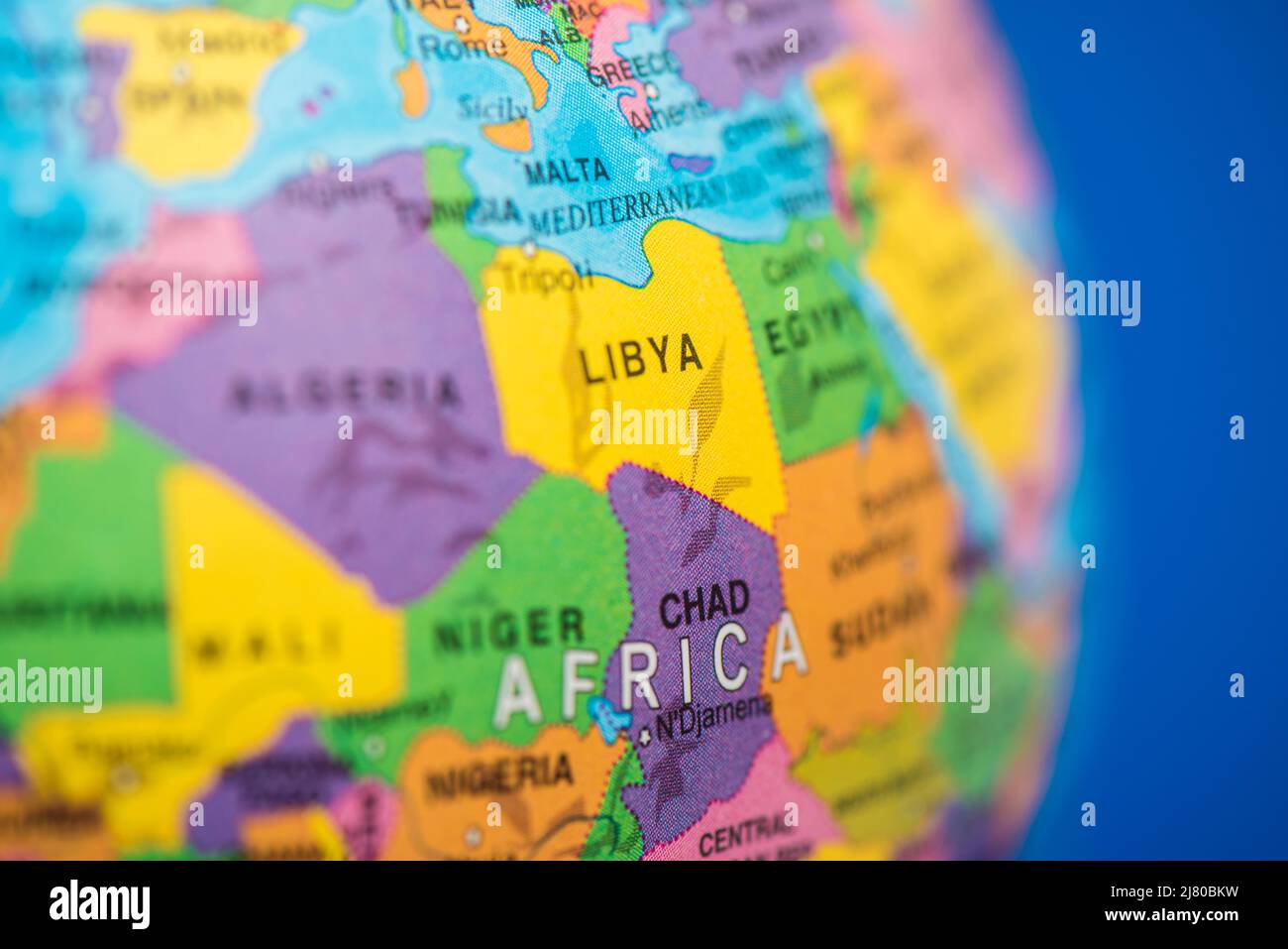 World globe ball on blue background Stock Photo - Alamy