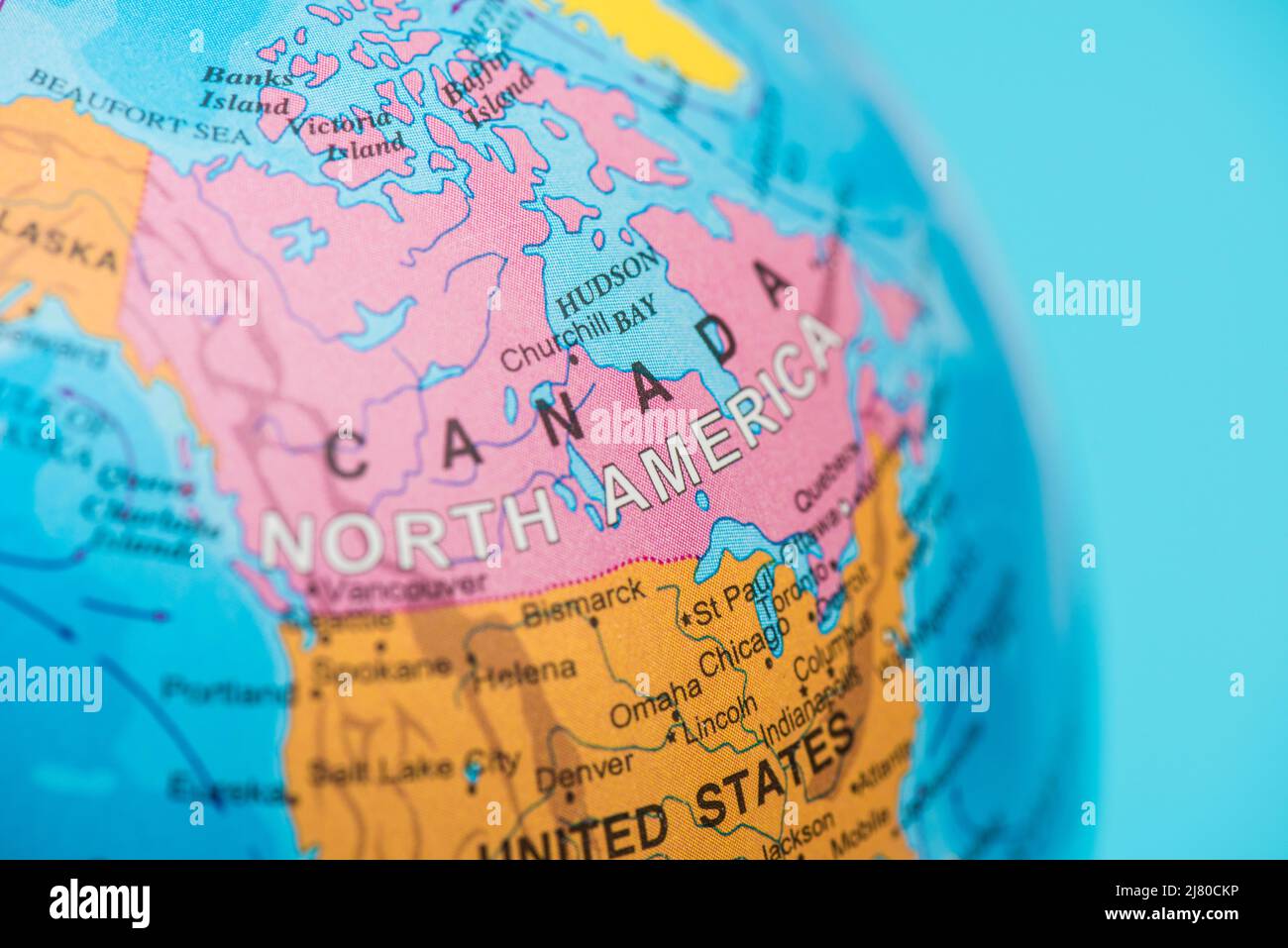 World globe ball on blue background Stock Photo - Alamy