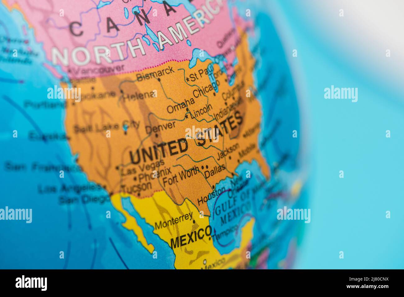 World globe ball on blue background Stock Photo - Alamy