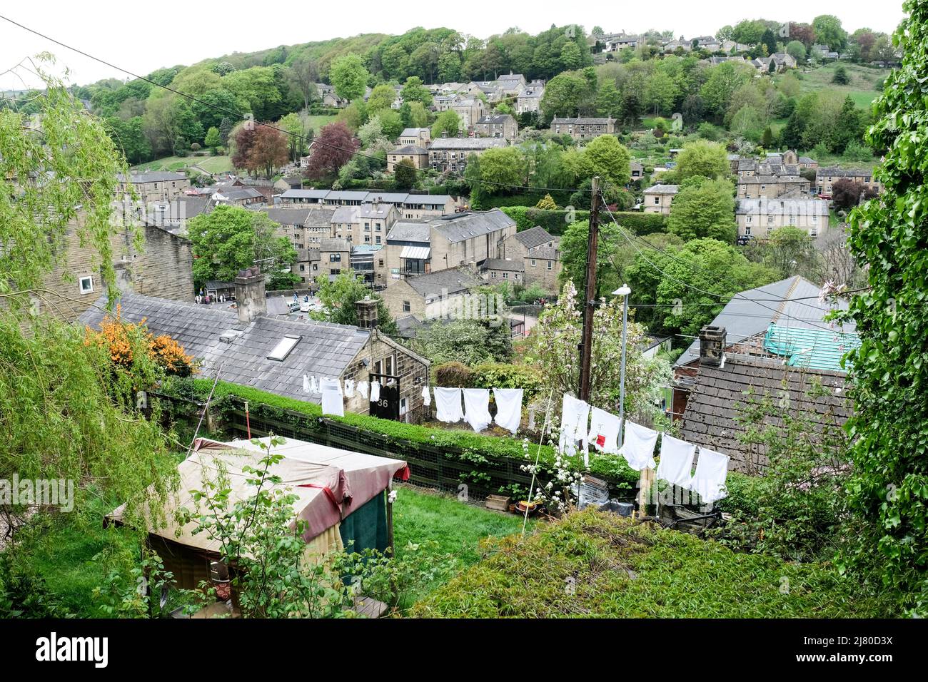 A view from above the West Yorkshire town of Holmfirth. Stone buildings ...