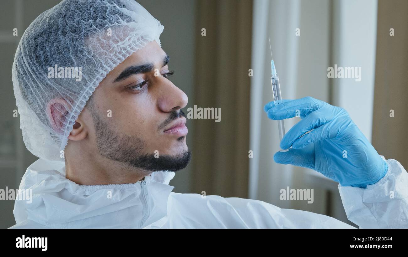 Young arabic male hispanic doctor practitioner surgeon in special ...