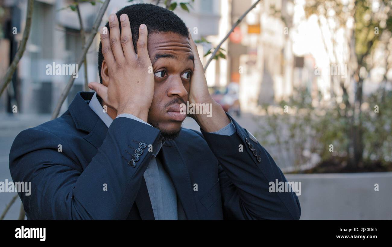 Pensive upset nervous black millennial student considering choice makes ...