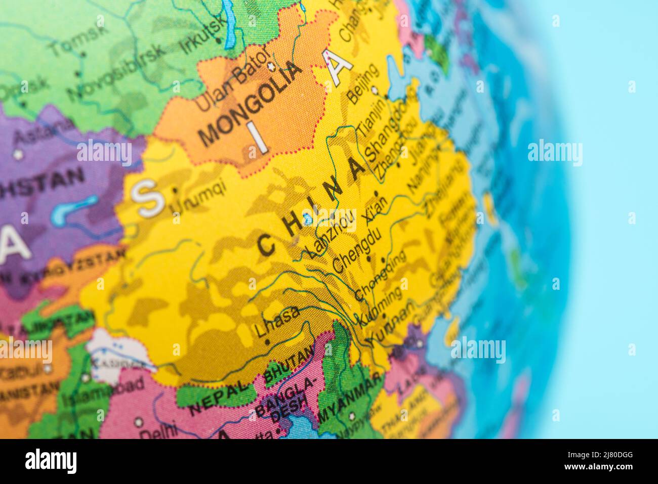 World globe ball on blue background Stock Photo - Alamy