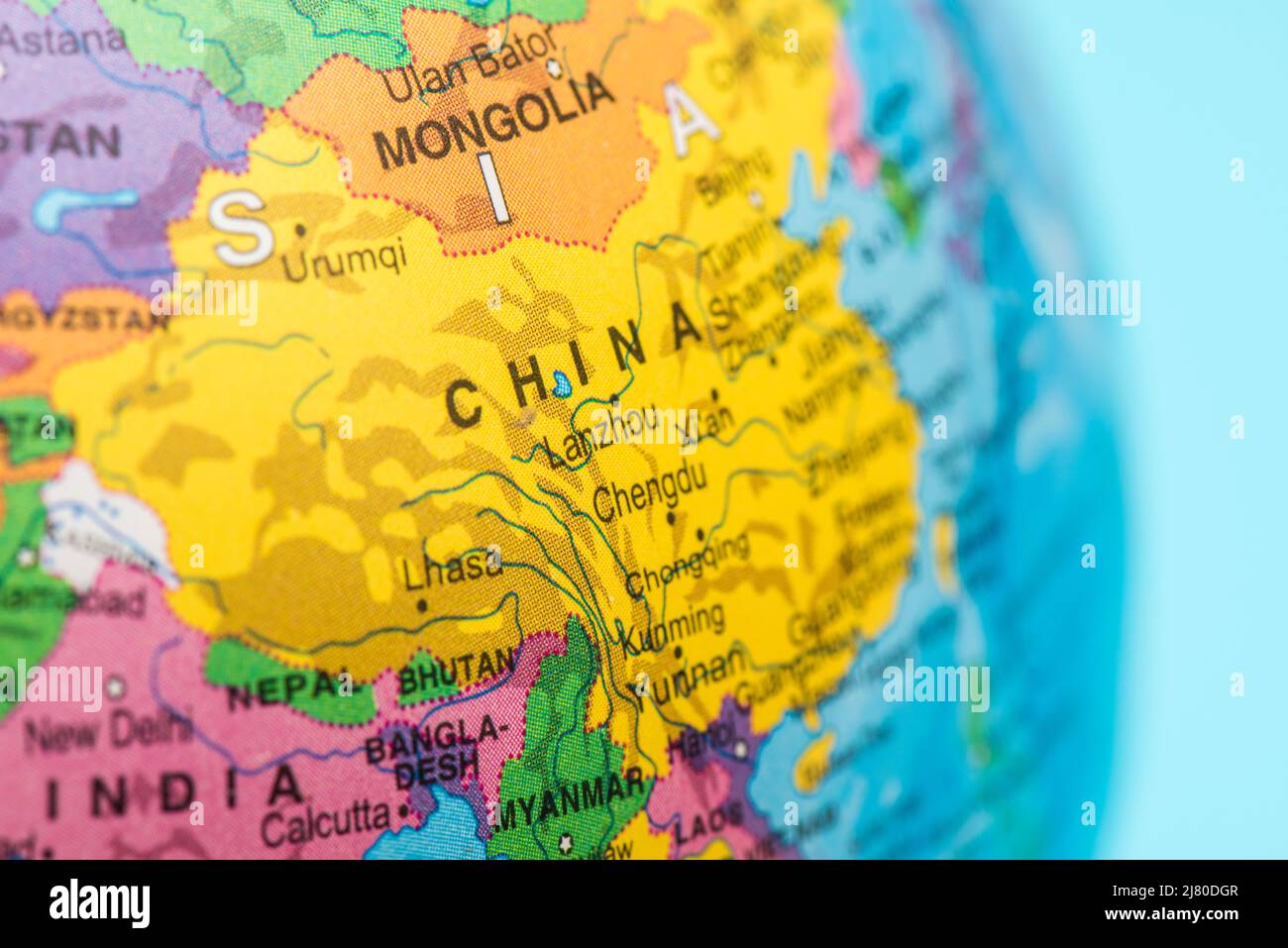 World globe ball on blue background Stock Photo - Alamy