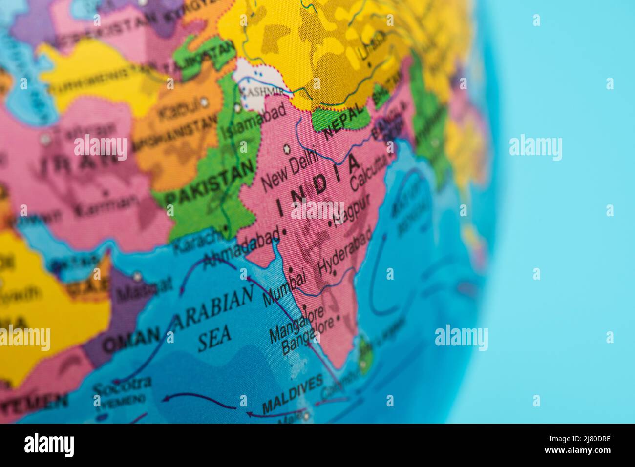 World globe ball on blue background Stock Photo - Alamy