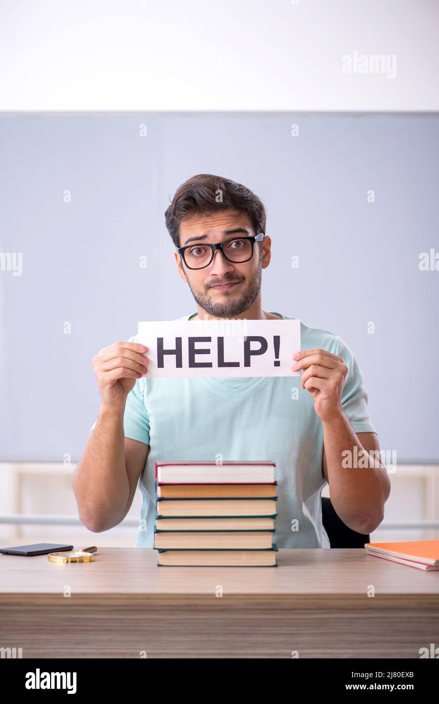 Asking for help classroom hi-res stock photography and images - Alamy