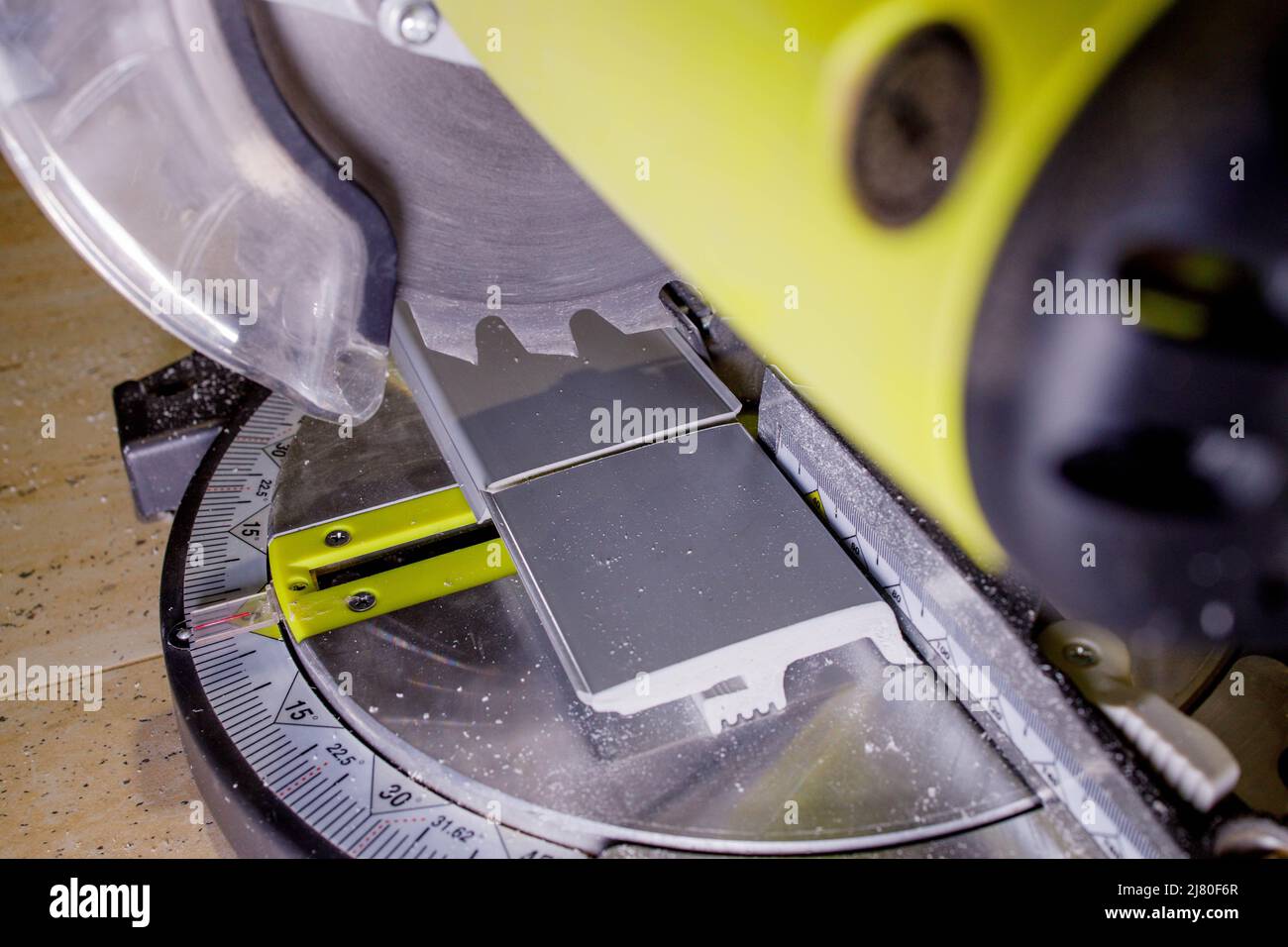 The circular saw cuts the plinth. Tool for repair work Stock Photo - Alamy