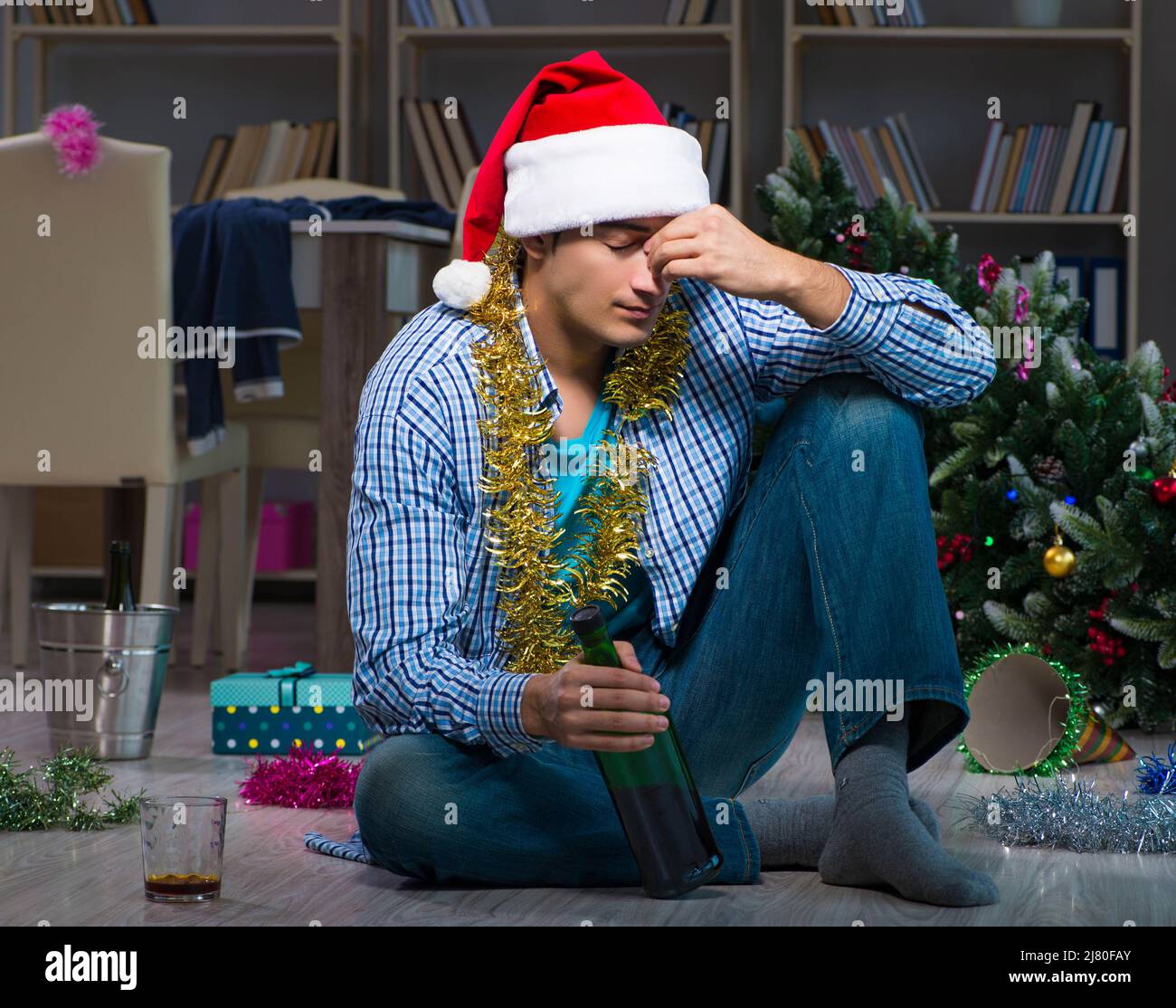 The man celebrating christmas at home alone Stock Photo - Alamy