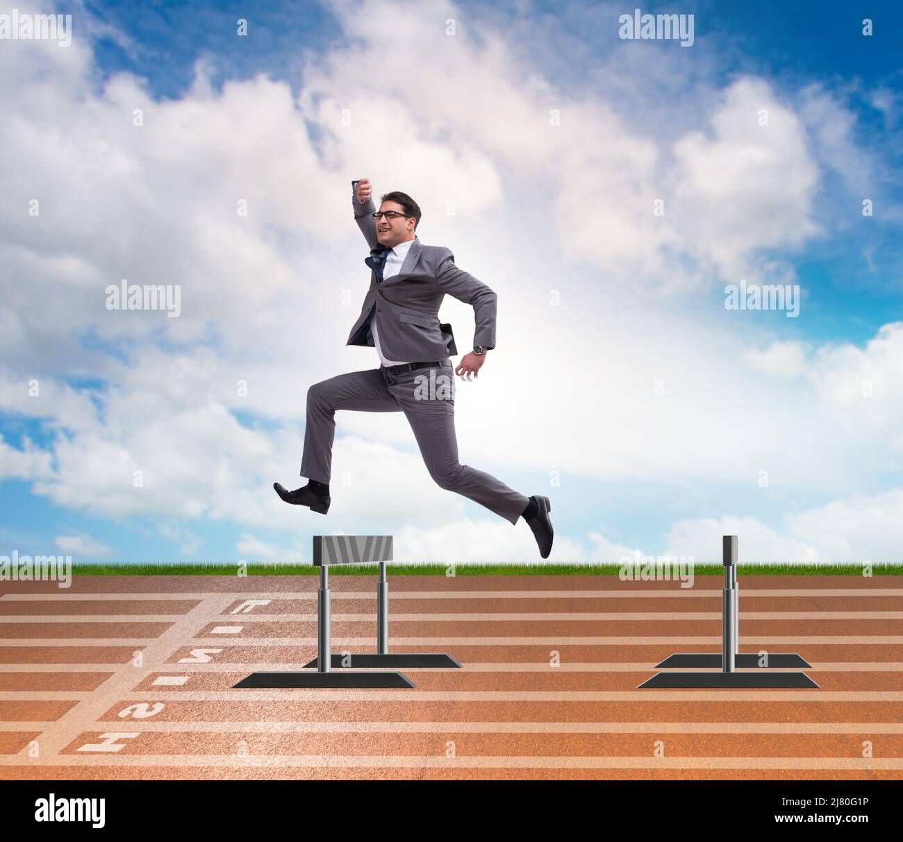 Businessman jumping over barriers hi-res stock photography and images ...