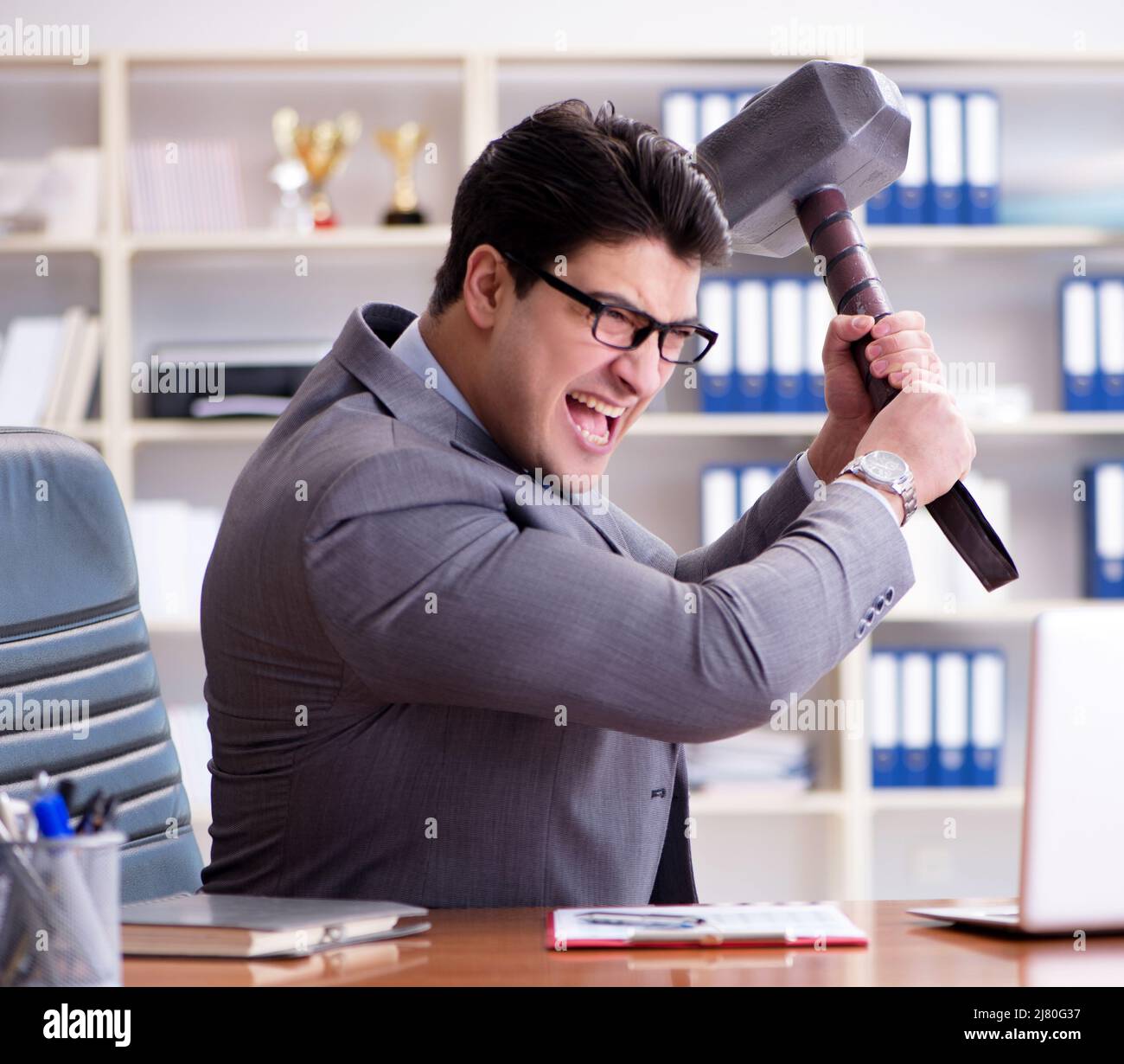 The angry aggressive businessman in the office Stock Photo - Alamy