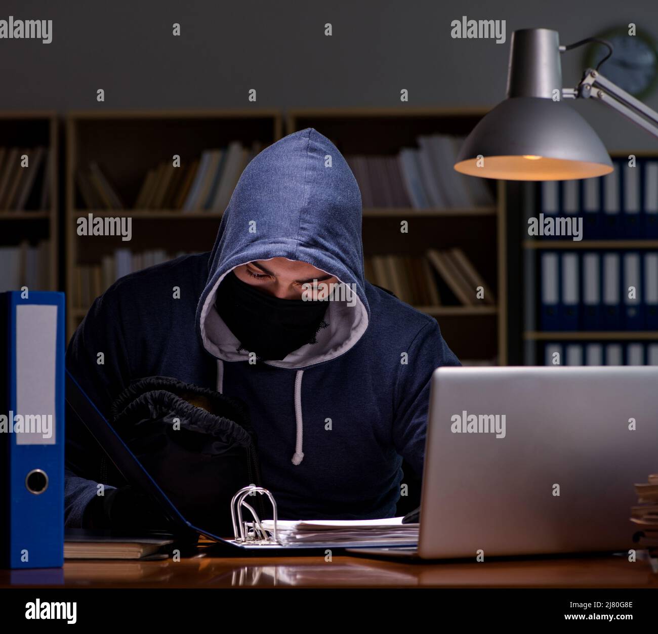 The hacker stealing personal data from home computer Stock Photo - Alamy
